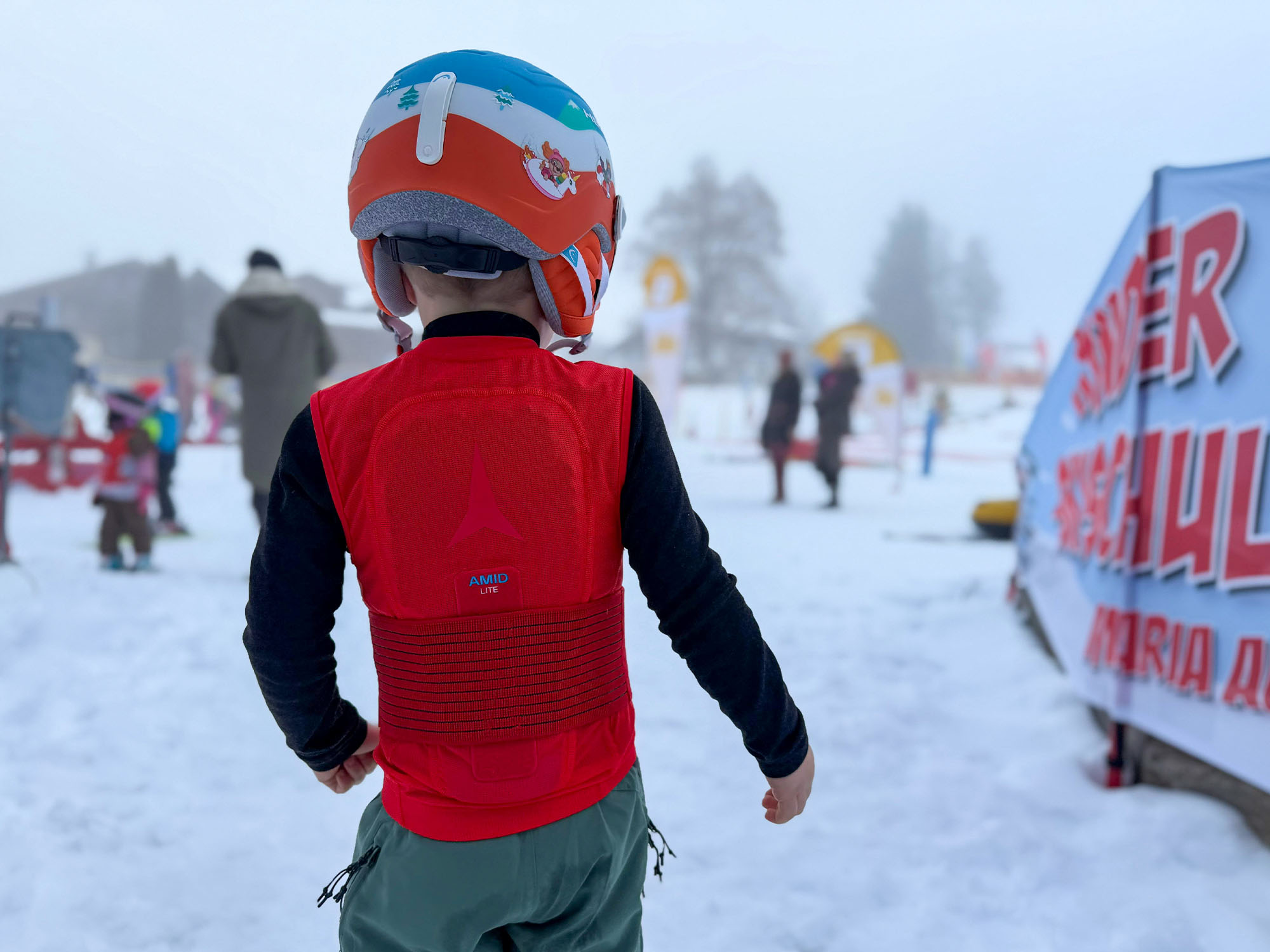 Rugbeschermer voor kinderen op wintersport: waar moet...